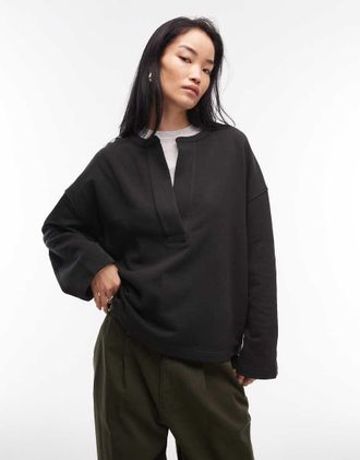 Arket Sweatshirt aus reiner Baumwolle in Schwarz mit V-Ausschnitt