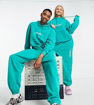 Collusion Unisex - Pantalon de jogging densemble &agrave; logo brod&eacute; - Vert d&eacute;lav&eacute;