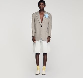 Sandro Veste en laine &agrave; carreaux et broche