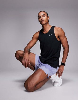 Nike Stride - Short 5 pouces en tissu Dri-FIT - Bleu clair