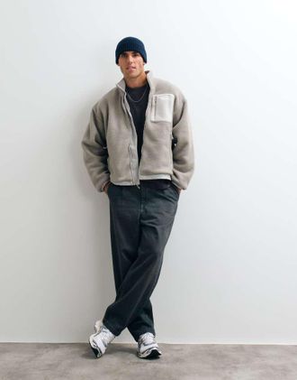 The North Face veste polaire r&eacute;versible Yumiori en cumulus cloud/stone sla-Gris