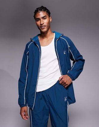 Liquor & Poker Veste de surv&ecirc;tement densemble en nylon avec passepoils et logo - Bleu marine