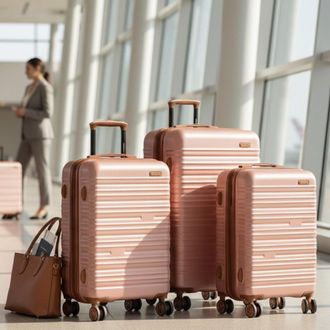 Infinity Leather Erweiterbarer Ros&eacute;gold-Hardshell-ABS-Koffer 8 Rads&auml;tze f&uuml;r gro&szlig;e Reisegep&auml;cke