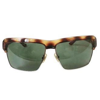 Miu Miu Tortoise Shell Sunglasses