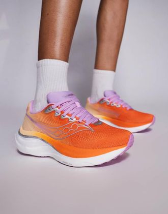 Saucony Ride 19 - Laufschuhe in Orange und Lila
