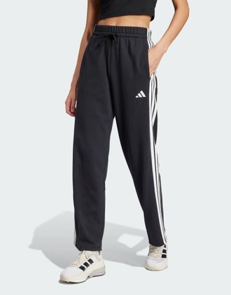 adidas adidas Performance - Essentials - Pantalon en tissu &eacute;ponge avec ourlet ouvert et logo 3 bandes - Noir/blanc