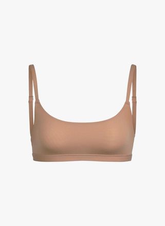 SKIMS Bralette unie &agrave; bretelles r&eacute;glables