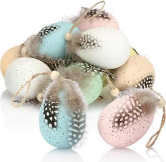 Com-Four 12x Ostereier zum Anhängen 7 x 4 cm - Hängedeko für den Osterstrauch - pastellfarbene Ostereier mit Federn und Holzperle in Wachtelei-Optik - Deko-Eie