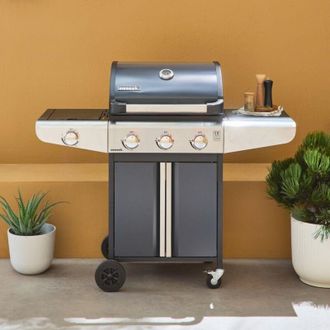 Alice's Garden Barbecue au gaz - Bazin 3 Gris anthracite - Cuisine ext&eacute;rieure 3 br&ucirc;leurs + 1 feu lat&eacute;ral avec tablettes et thermom&egrave;tre. rangement. roues