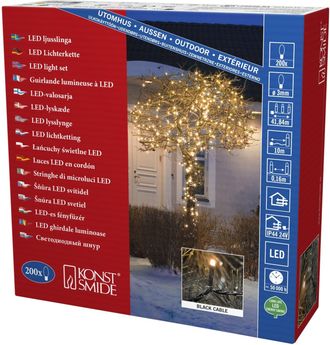 Konstsmide Micro LED Lichterkette, 200 bernsteinfarbene Dioden, 24V Au&szlig;entrafo, schwarzes Kabel - 3613-800, Bernstein