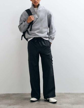 Rains wasserdichte Cargo-Hose mit elastischem Bund und Wide Fit in Schwarz