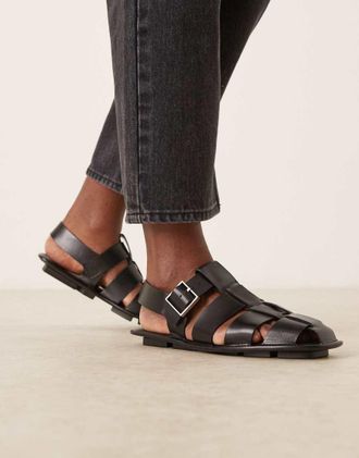 Calvin Klein Jeans - Flache Ledersandalen in Schwarz mit Schnalle im Seemannsstil