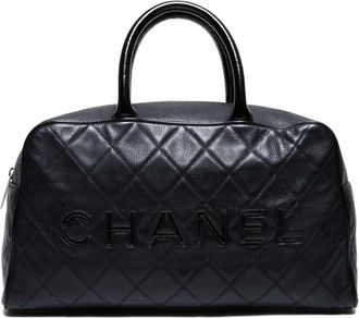 Chanel 2000-2002 gesteppte Bowlingtasche mit Logo-Prägung - Schwarz