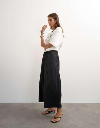 Topshop pantalon technique oversize &agrave; jambe ovale mi-long noir