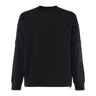 C.P. Company C.p. Company, Homme, Sweatshirts et sweats &agrave; capuche, Noir, Taille: L SweaT-shirt noir en coton avec poches sur les bras
