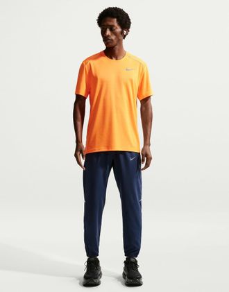 Nike Homme Miler Dri-FIT pantalon tiss&eacute; bleu