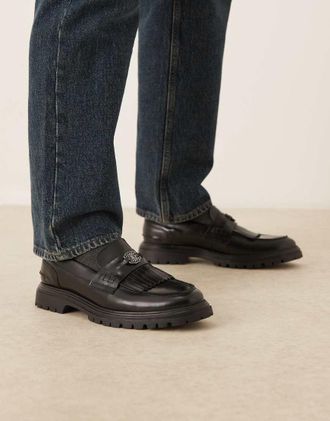 Noak Made in Portugal - Loafer aus schwarzem Leder mit Quasten und goldfarbener Metallverzierung