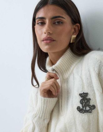 Ralph Lauren pull torsad&eacute; &agrave; demi-zip avec &eacute;cusson poitrine en cr&egrave;me-Blanc