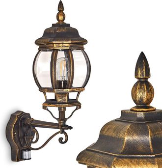 HOFSTEIN Außenwandleuchte Lentua m. Bewegungsmelder, Wandlampe aufwärts in antikem Look, Aluguß in Braun/Gold m. Kunststoff-Scheiben, Wandleuchte für Terrasse/