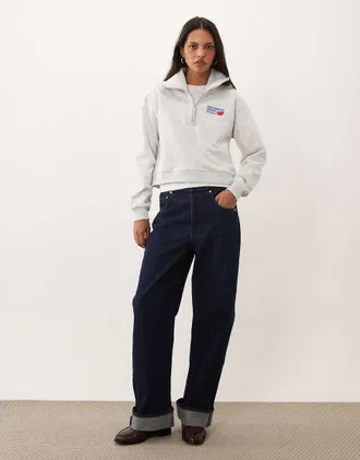 New Balance pull oversize &agrave; demi-zip avec logo premium gris