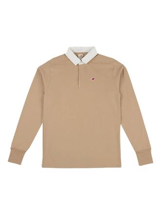 New Balance polo en coton &agrave; poignets c&ocirc;tel&eacute;s - Marron