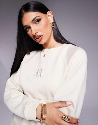 A|X Armani Exchange Sweatshirt in Creme mit mittigem, gleichfarbigem Logo-Wei&szlig;