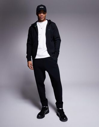 HUGO BOSS Hadiko - Pantalon de jogging densemble coupe classique resserré aux chevilles - Noir