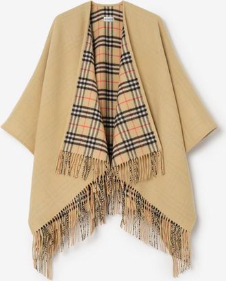 Burberry Cape r&eacute;versible en laine Check