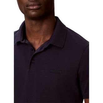 Calvin Klein Polo uni &agrave; patch logo brod&eacute; en coton