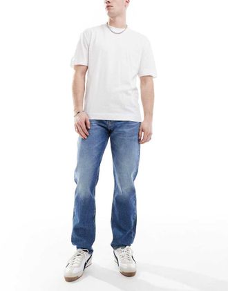 Calvin Klein Jeans Jean droit slim - Bleu moyen d&eacute;lav&eacute;