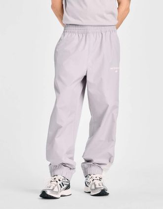 New Balance Trackside - Hose aus Webstoff in der Farbe Truffle Salt-Grau