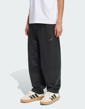adidas adidas Performance - Z.N.E. - Pantalon avec ourlet ouvert - Noir
