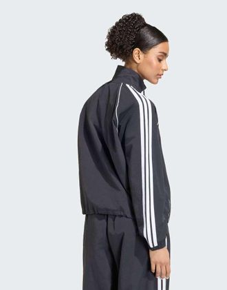 adidas adidas Performance - Iconic - Haut de surv&ecirc;tement tiss&eacute; avec 3 bandes - Noir/blanc