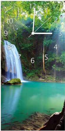 Wallario Design-Wanduhr, Acrylglasuhr Größe 30 x 60 cm, weiße Zeiger, Motiv Wasserfall im Wald am See Idylle in Thailand