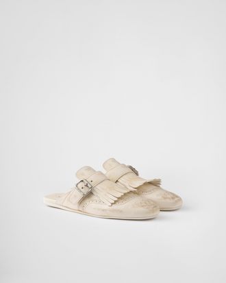 Prada Shuffle Mules aus Leder mit Fransen