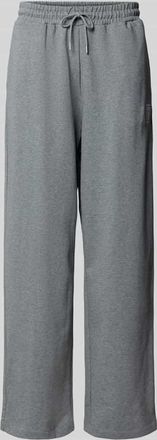 Calvin Klein Flared Sweatpants mit Gesäßtaschen Modell PREMIUM TERRY