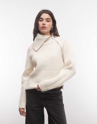 AllSaints Cleo Strickpullover mit Stehkragen aus Merinowolle und Rei&szlig;verschluss in Wei&szlig;