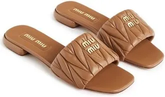Miu Miu Mules matelass&eacute; en cuir