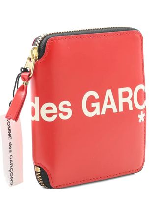 Comme Des Garçons portefeuille zippé en cuir à logo imprimé - Rouge