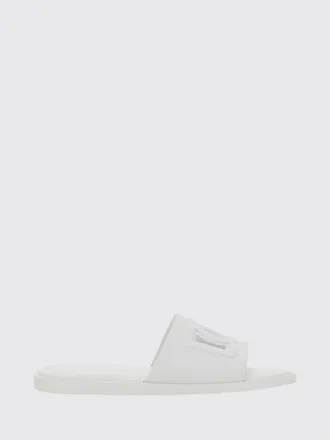 Dolce & Gabbana Mules plates en caoutchouc avec monogramme DG grav&eacute;