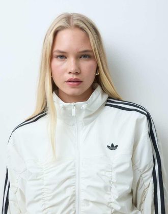 adidas Originals veste de surv&ecirc;tement fronc&eacute;e &eacute;cru-Blanc