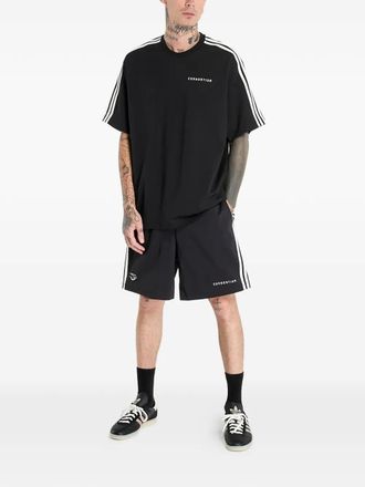 adidas By Consortium stripe-detail track shorts - Noir