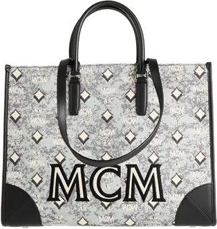 MCM SACS - Sacs port&eacute; &eacute;paule sur YOOX.COM