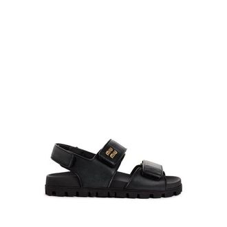 Miu Miu Sandales plates en cuir