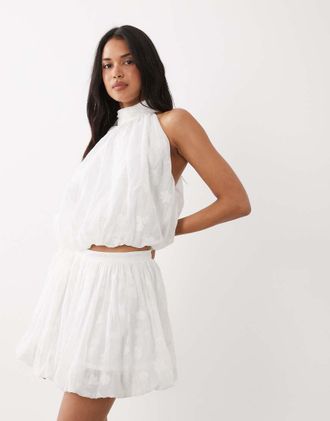 Gina Tricot Gina Tricot - Top densemble sans manches &agrave; dos nu et imprim&eacute; fleuri - Blanc