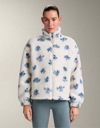 Oysho Veste en imitation peau de mouton &agrave; fleurs - Bleu poudr&eacute;