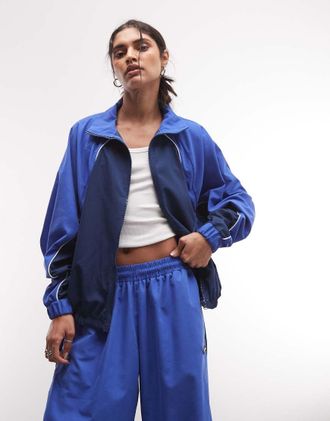 Collusion Nylon-Jacke mit Eins&auml;tzen in Blau und Marineblau