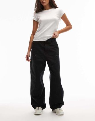 Carhartt Work in Progress Brandon - Locker und gerade geschnittene Denim-Jeans im abgenutzten Look in Schwarz mit verst&auml;rkter Kniepartie