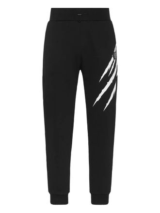Plein Sport pantalon de jogging &agrave; imprim&eacute; griffes - Noir