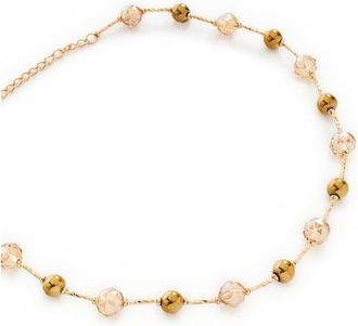 Au Printemps Paris Collier à perles